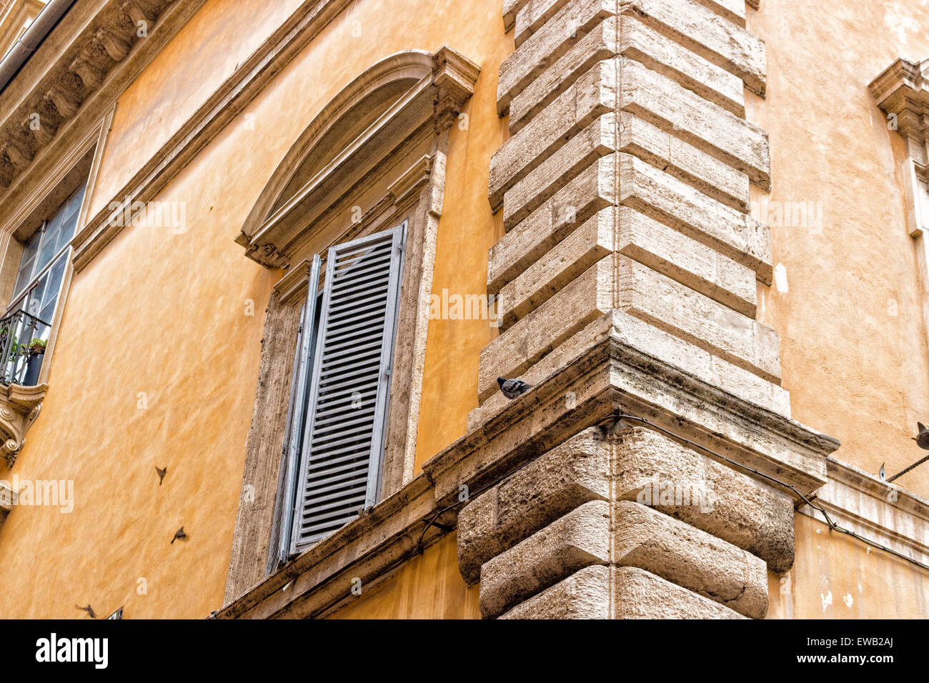 Windows of historical building in the center of Rome Stock Photo - Alamy