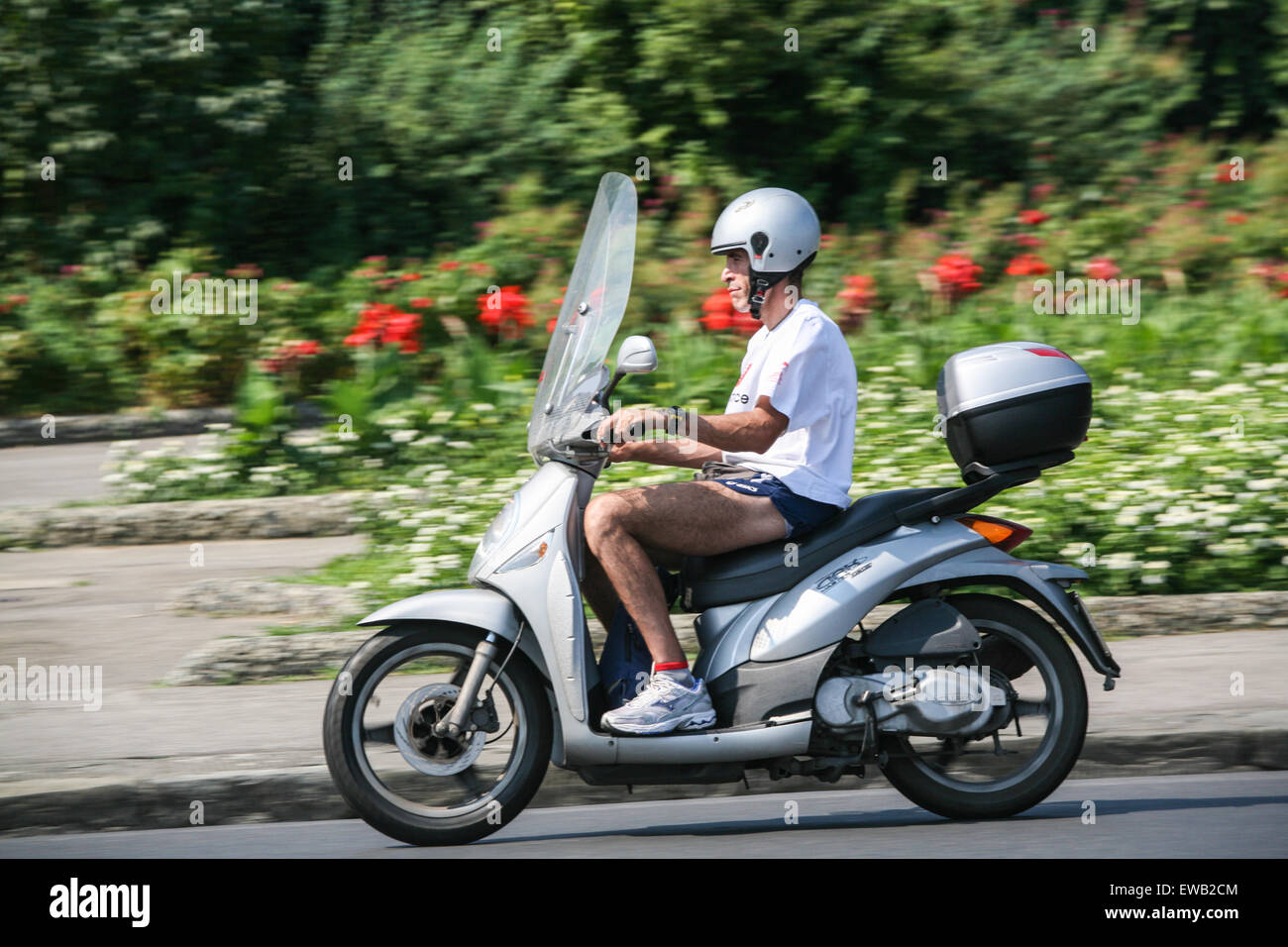 On scooter across large square Piazzale Michelangelo overlooking ...