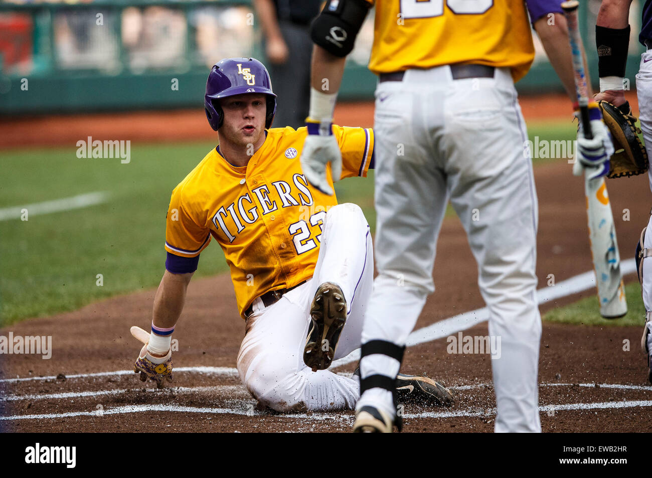 June 18, 2015: LSU Jake Fraley #23 slides safely scoring the 1st run of ...