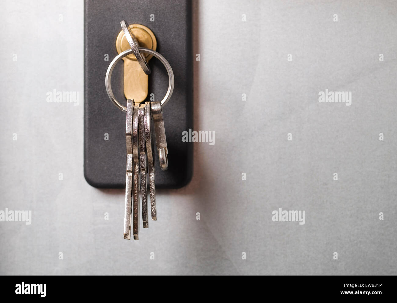 Keys stuck in a lock. The photo shows a macro detail Stock Photo - Alamy