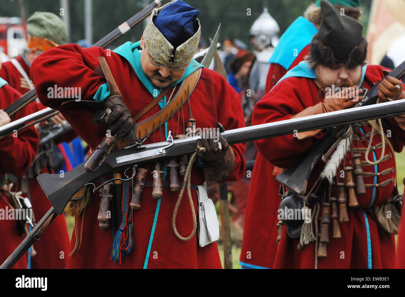 RUSSIA, MOLODI VILLAGE - JULY 27: Unidentified people reloading the ...