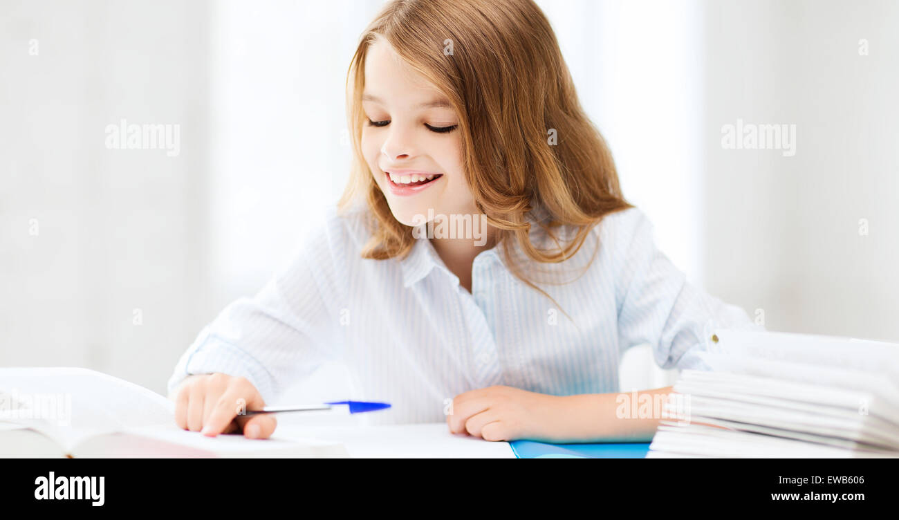 student girl studying at school Stock Photo - Alamy