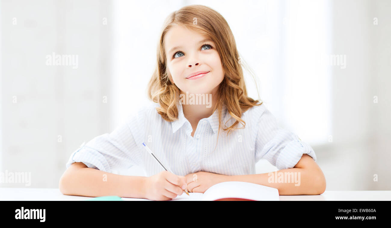 student girl studying at school Stock Photo - Alamy