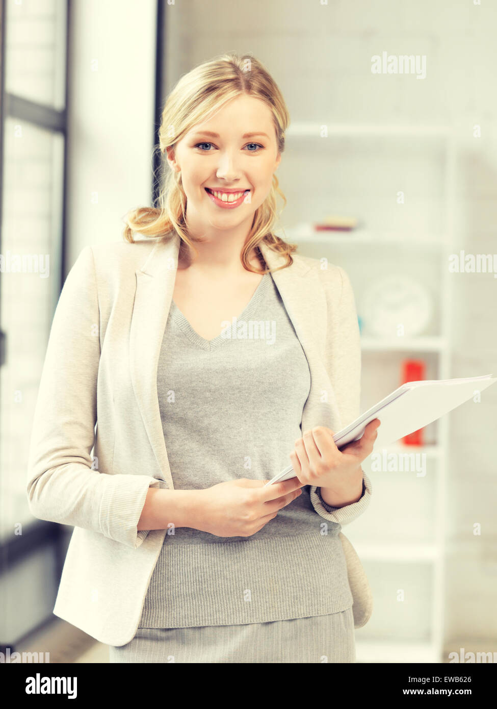 happy woman with documents Stock Photo - Alamy