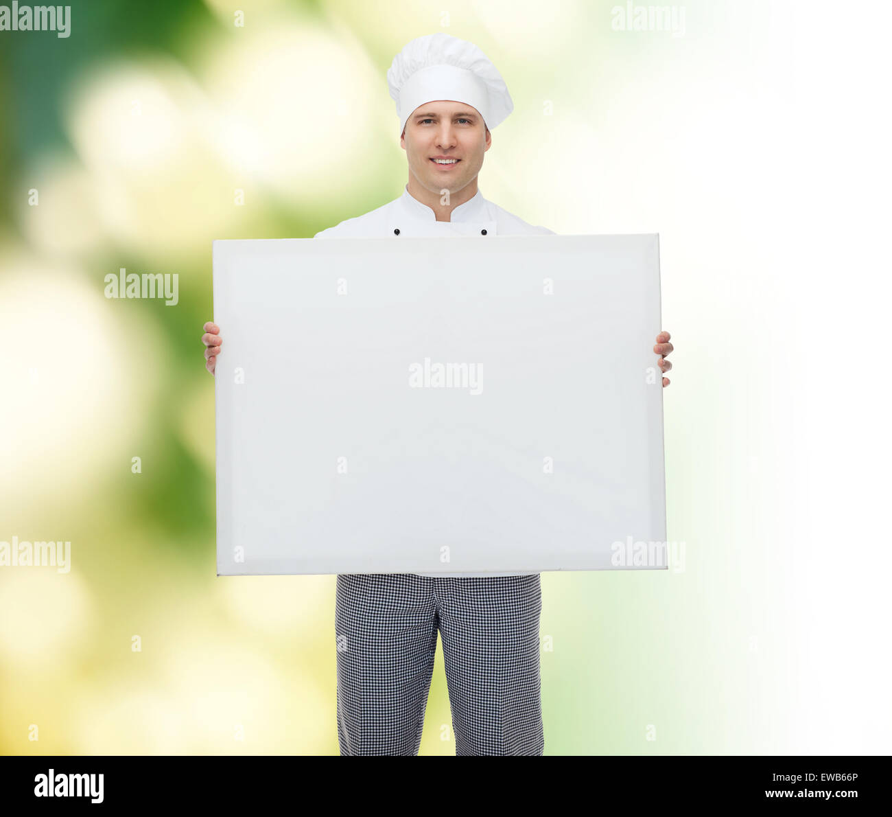 happy male chef cook holding white blank big board Stock Photo - Alamy
