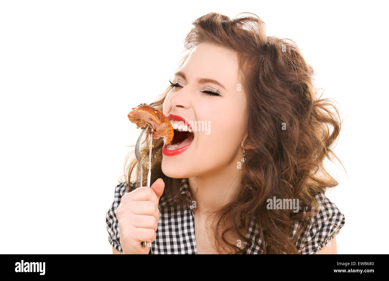 paleo diet concept - woman eating meat Stock Photo - Alamy