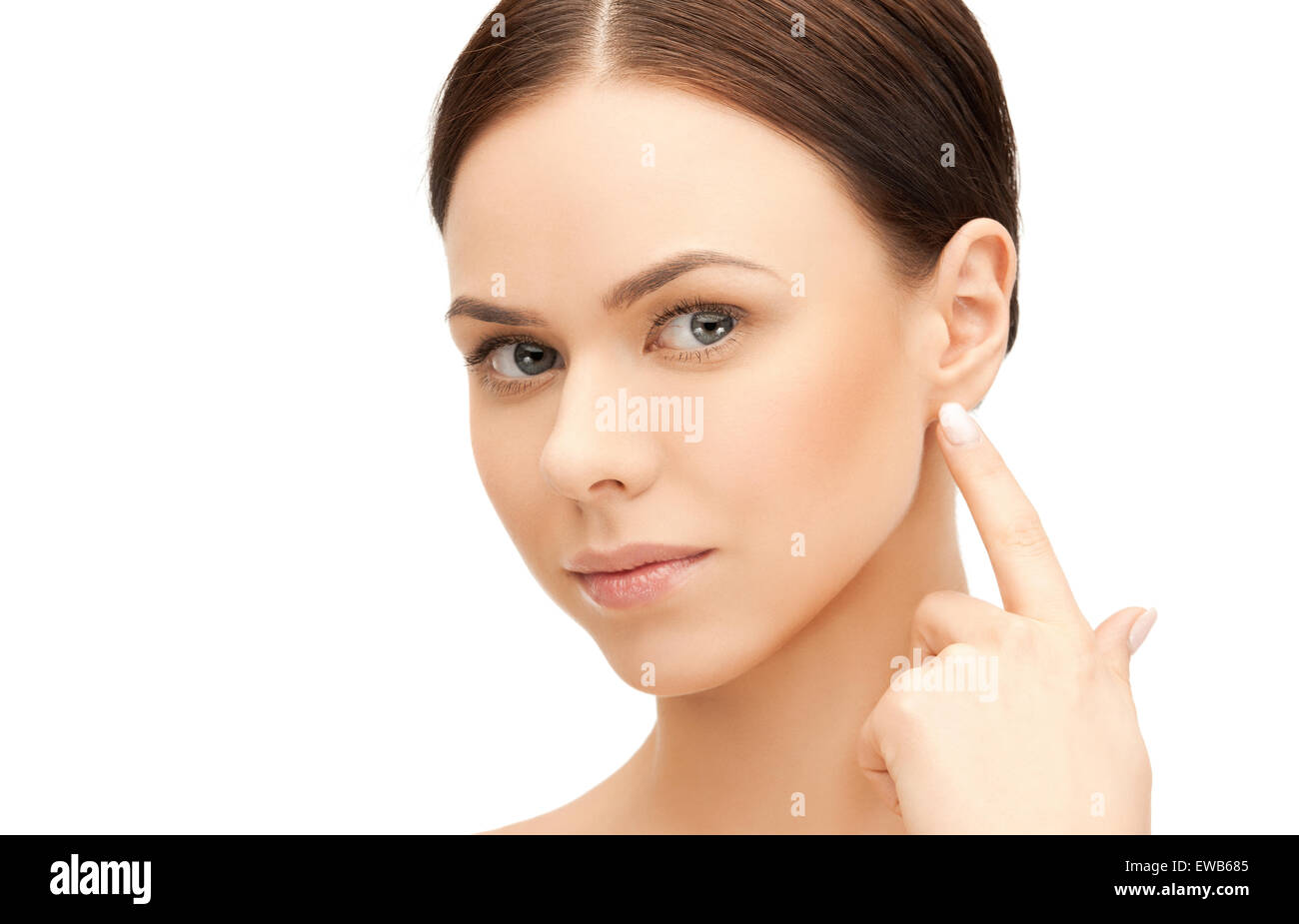 woman touching her ear Stock Photo - Alamy