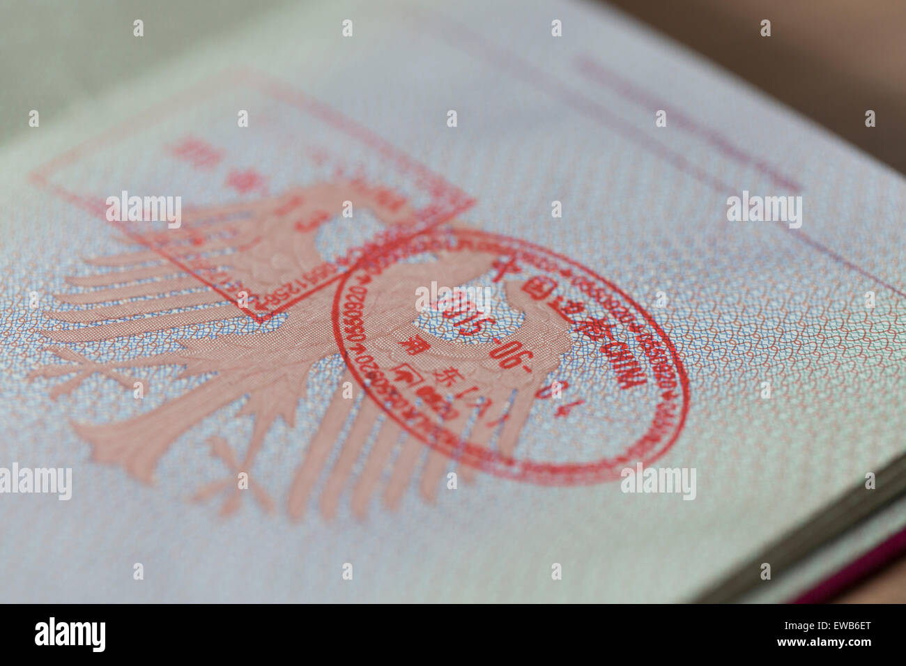Chinese Entry and Exit Stamps in a german Passport Stock Photo - Alamy