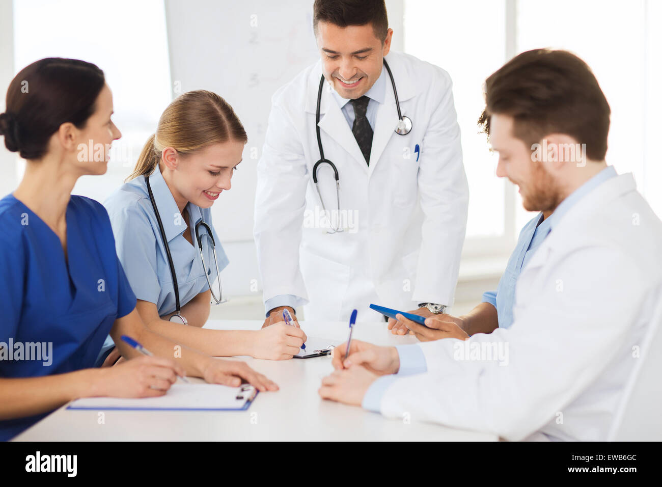 group of happy doctors meeting at hospital office Stock Photo - Alamy