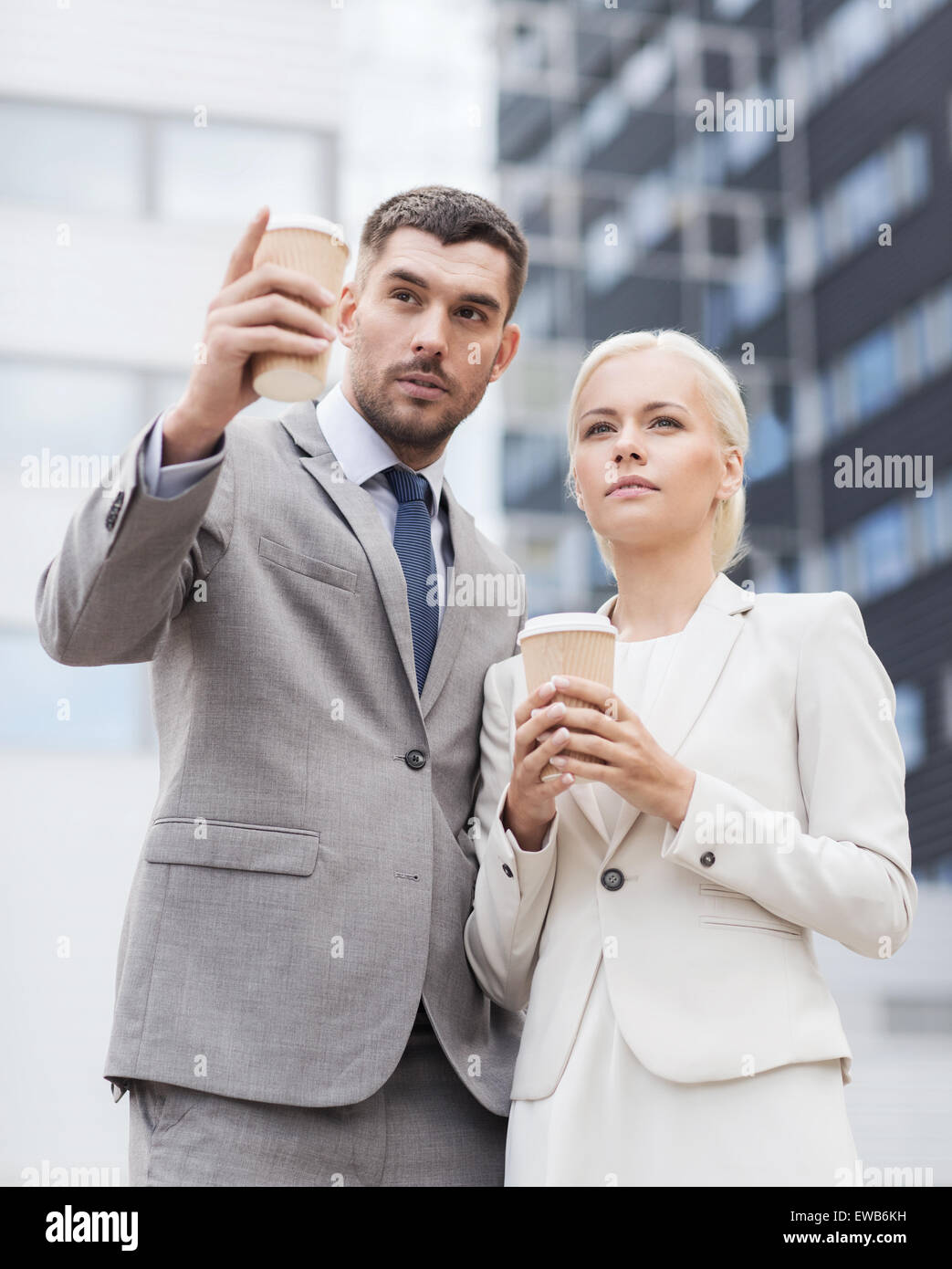 serious businessmen with paper cups outdoors Stock Photo - Alamy