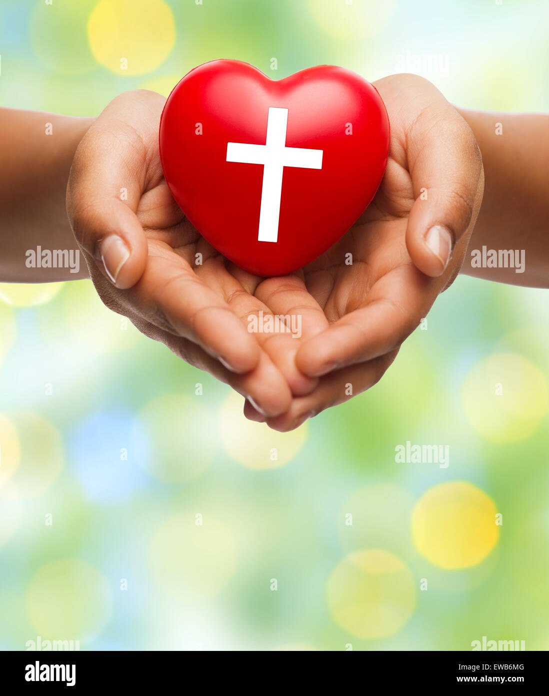 Jesus christ holding heart shape hi-res stock photography and images ...