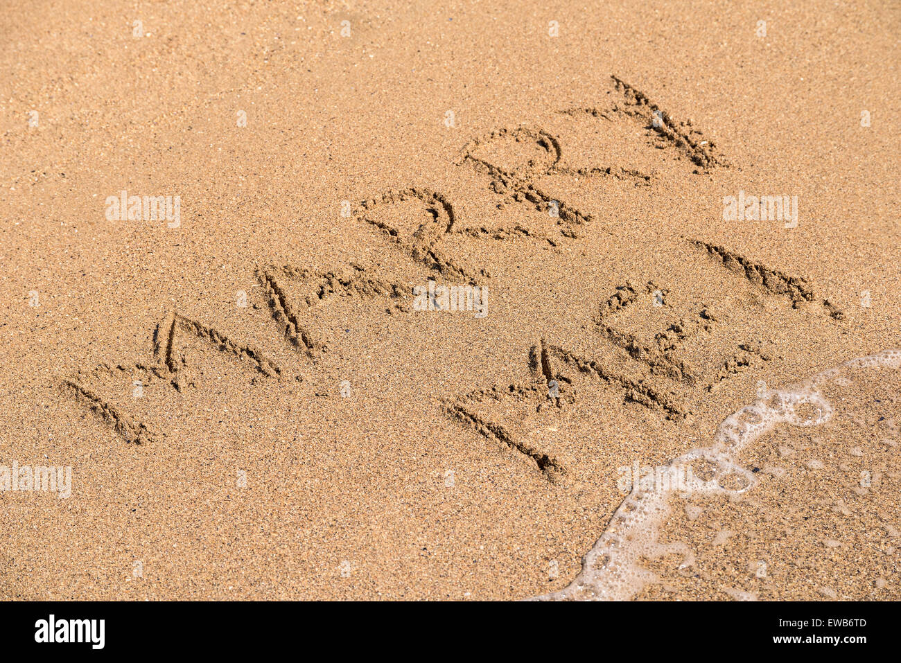Marry Me Word Written On Sunny Summer Beach Sand Stock Photo - Alamy