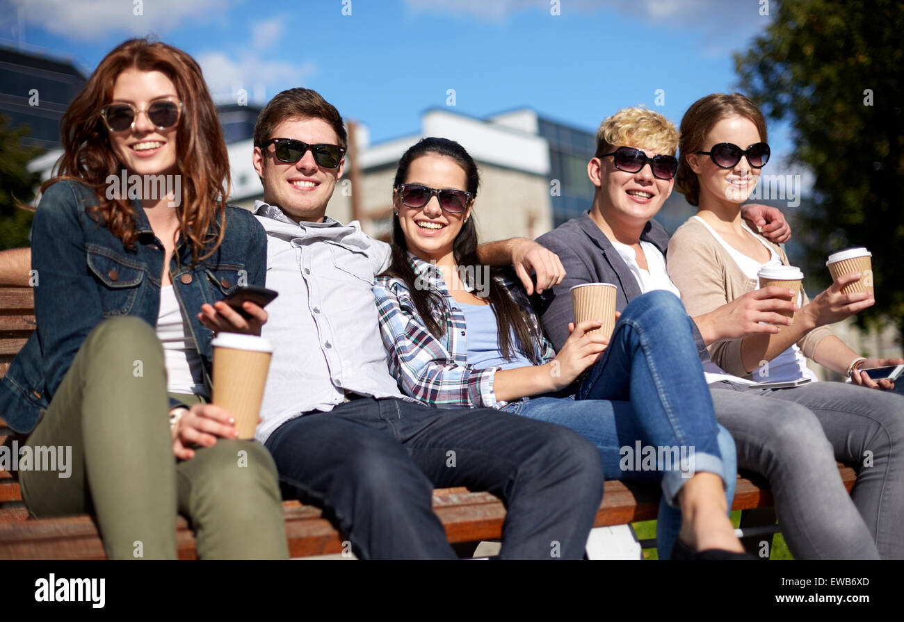 group of students or teenagers drinking coffee Stock Photo - Alamy