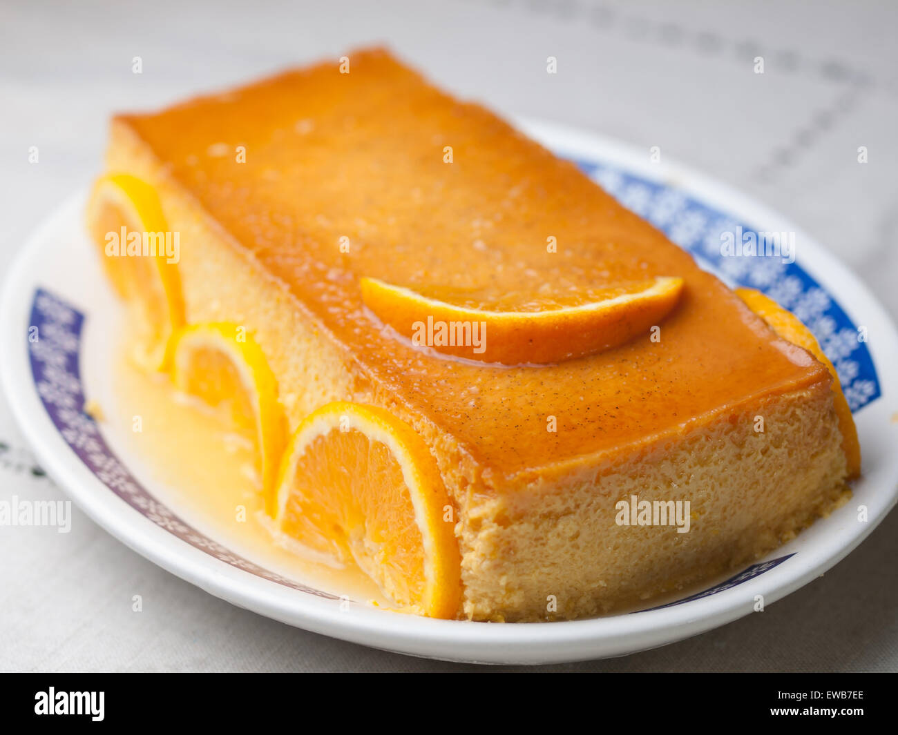 Orange custard in a studio shot. A delicious dessert Stock Photo - Alamy