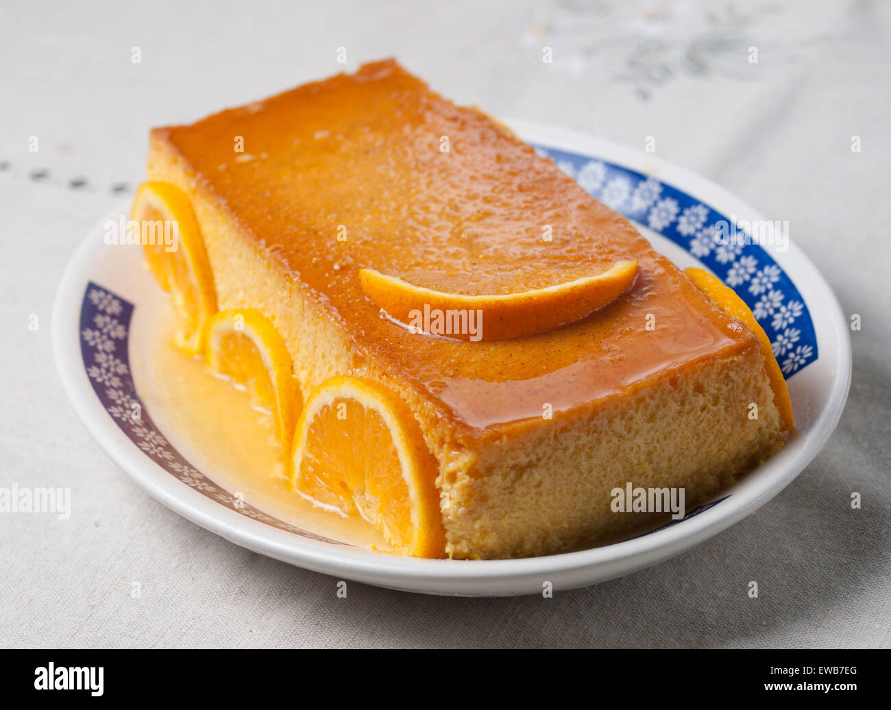 Orange custard in a studio shot. A delicious dessert Stock Photo - Alamy