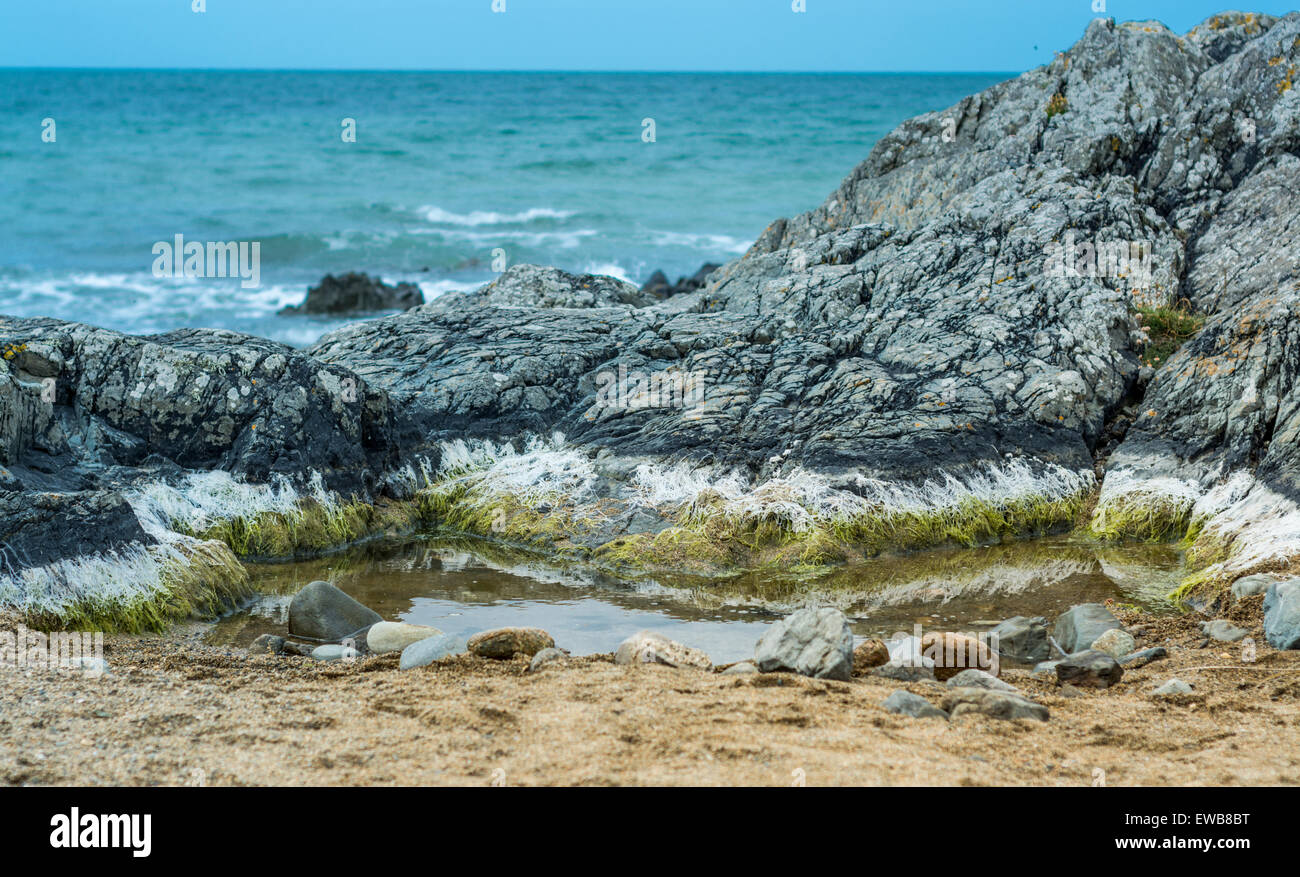 Rock pool at Porth Nobla, Rhosneigr, Anglesey, North Wales,Uk Stock ...