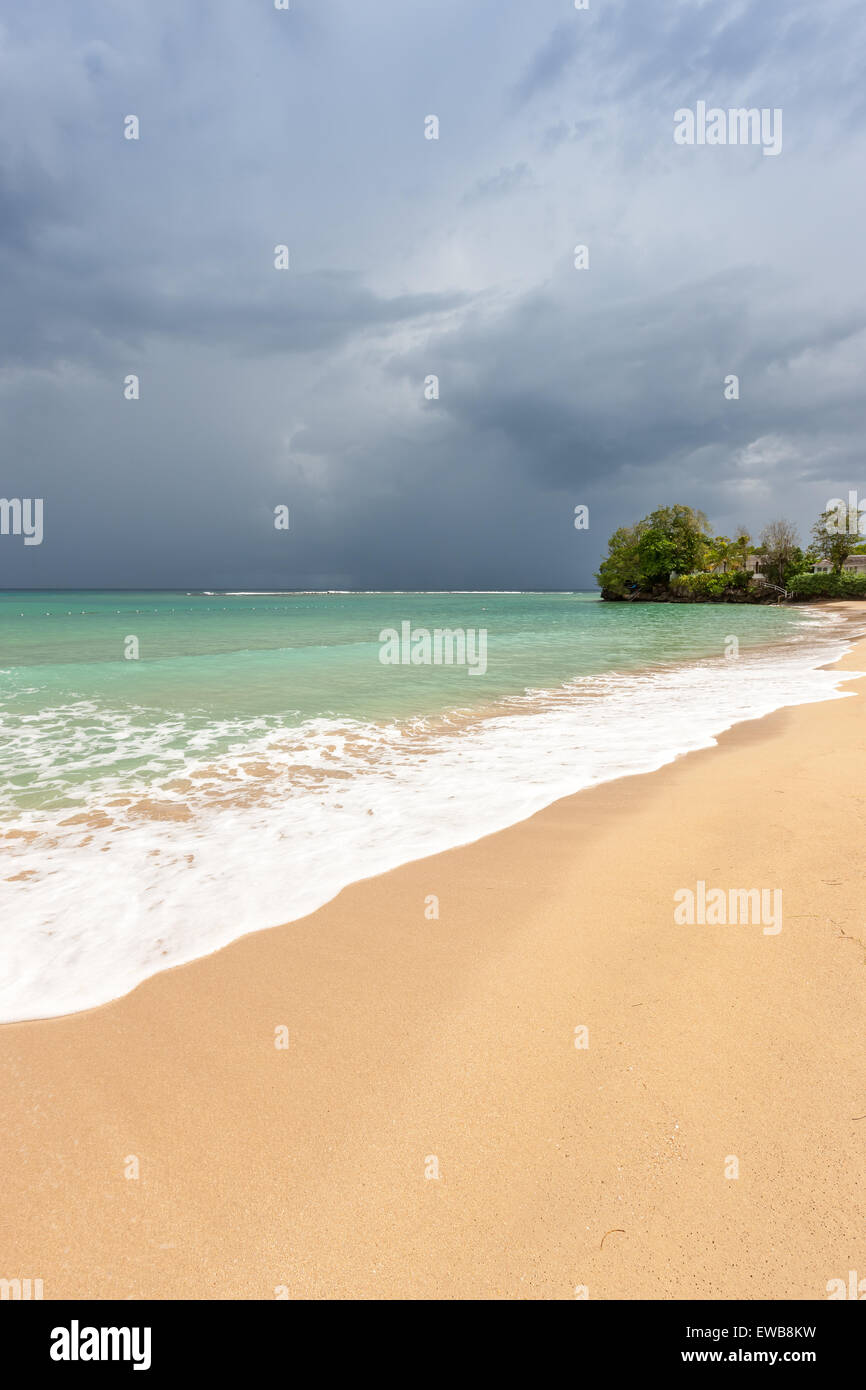 Beach on tropical island. Clear blue water, sand, clouds Stock Photo ...