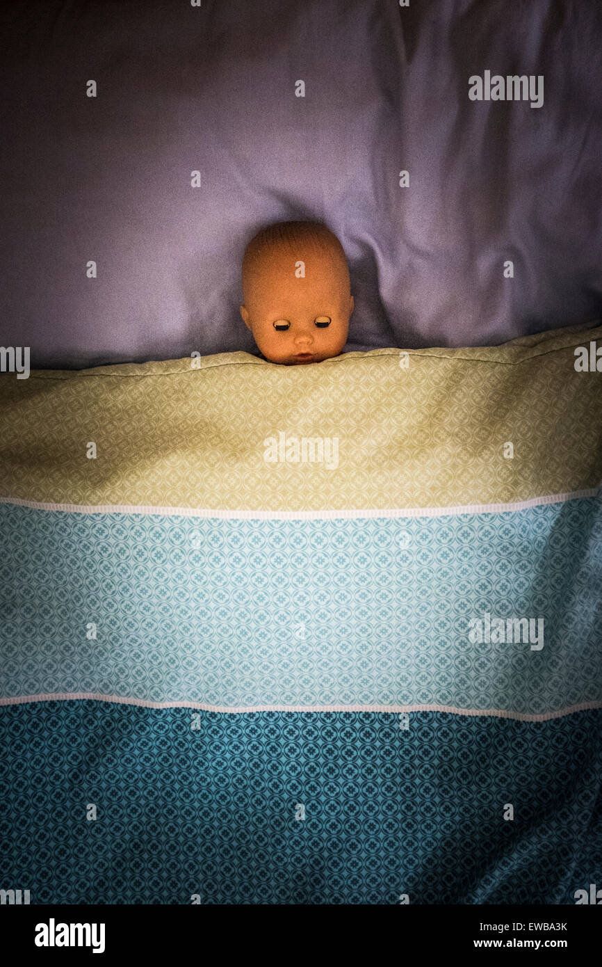 Sleeping with doll hi-res stock photography and images - Alamy