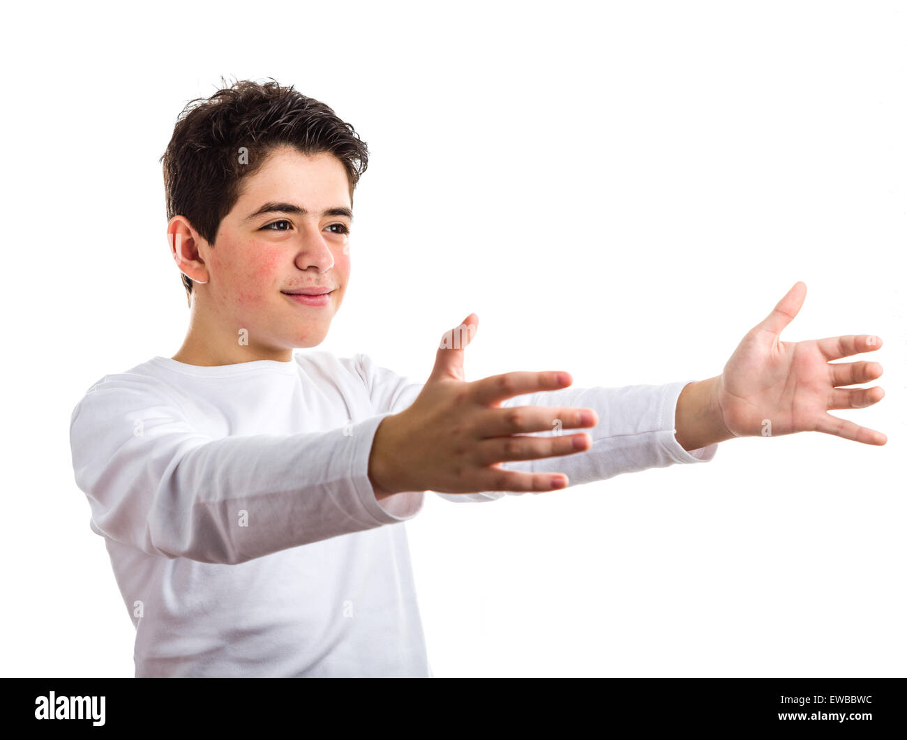 Handsome Caucasian boy with acne-prone skin in a white long sleeved t ...