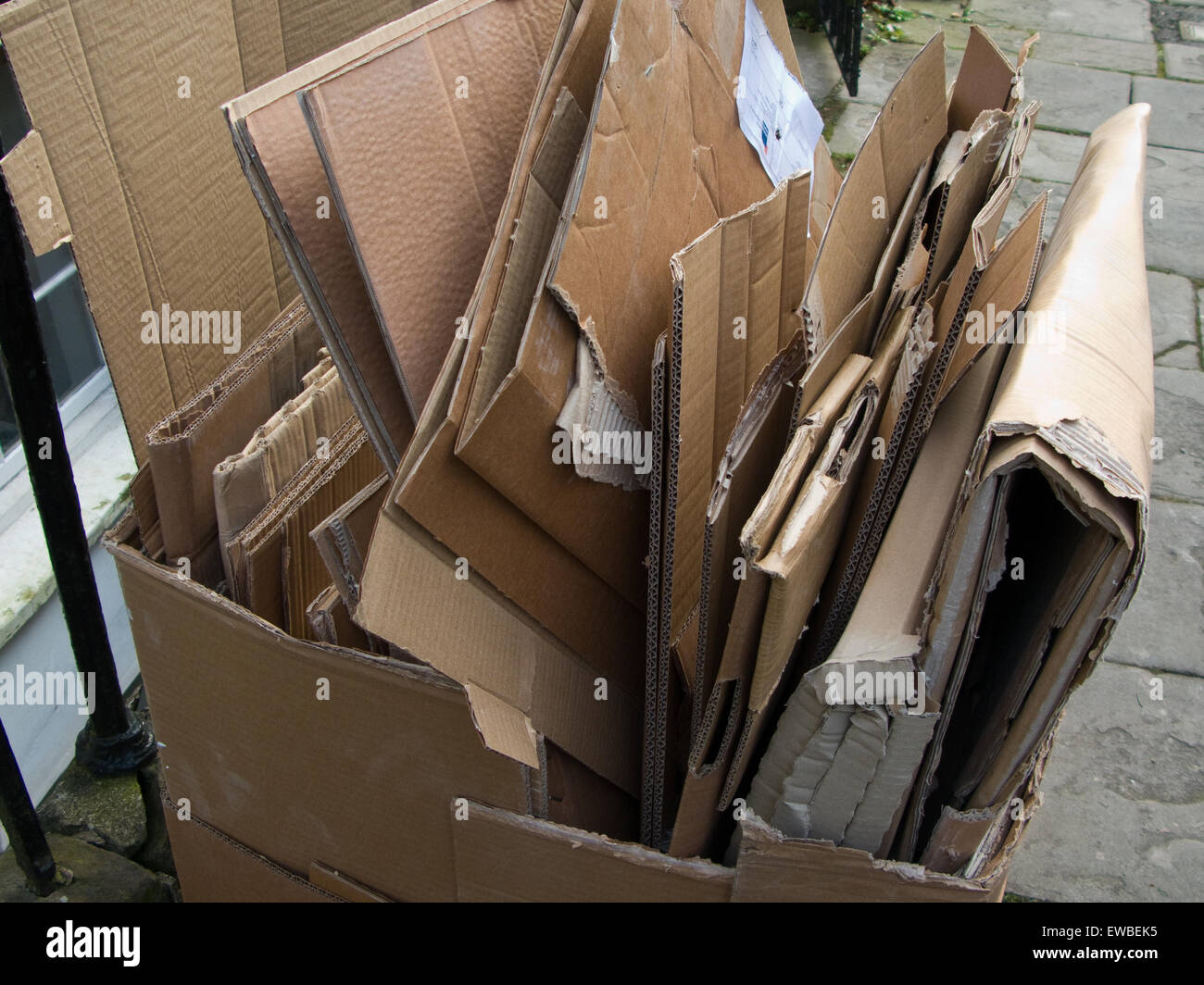 Cardboard ready for the recycling collectors on street Stock Photo - Alamy