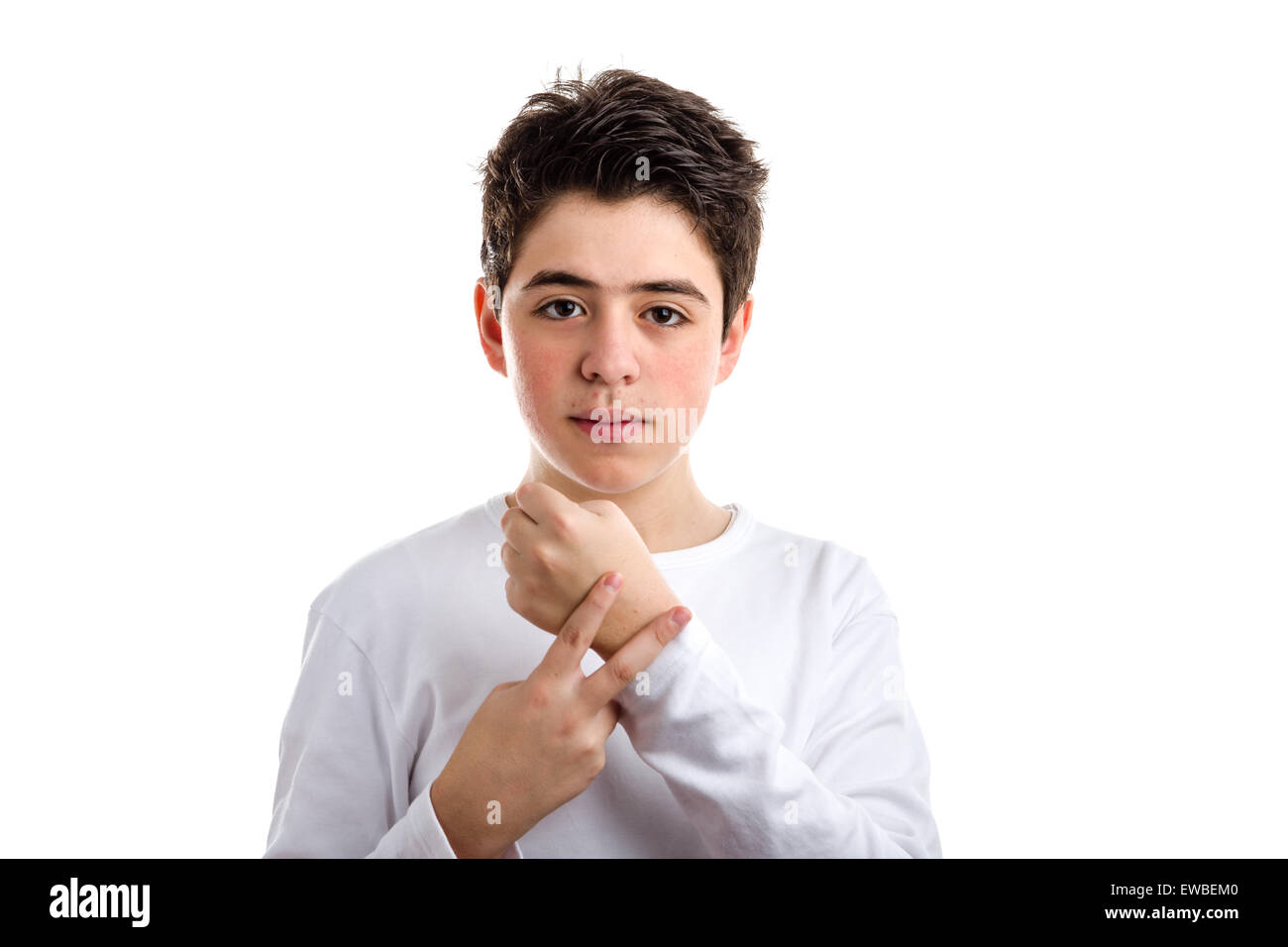Cute Caucasian boy with acne-prone skin in a white long sleeved t-shirt ...