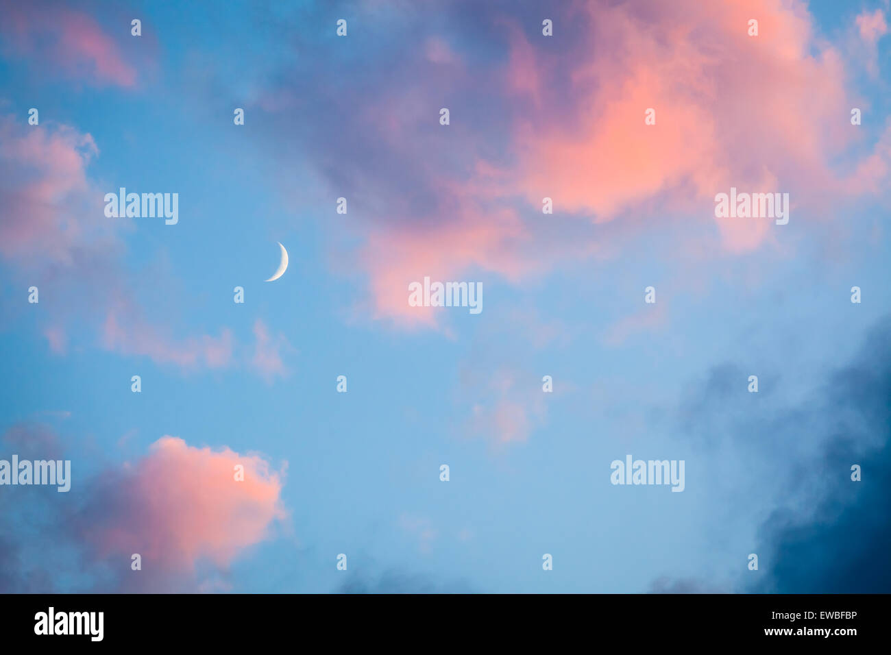 Pink clouds and moon heaven Stock Photo - Alamy