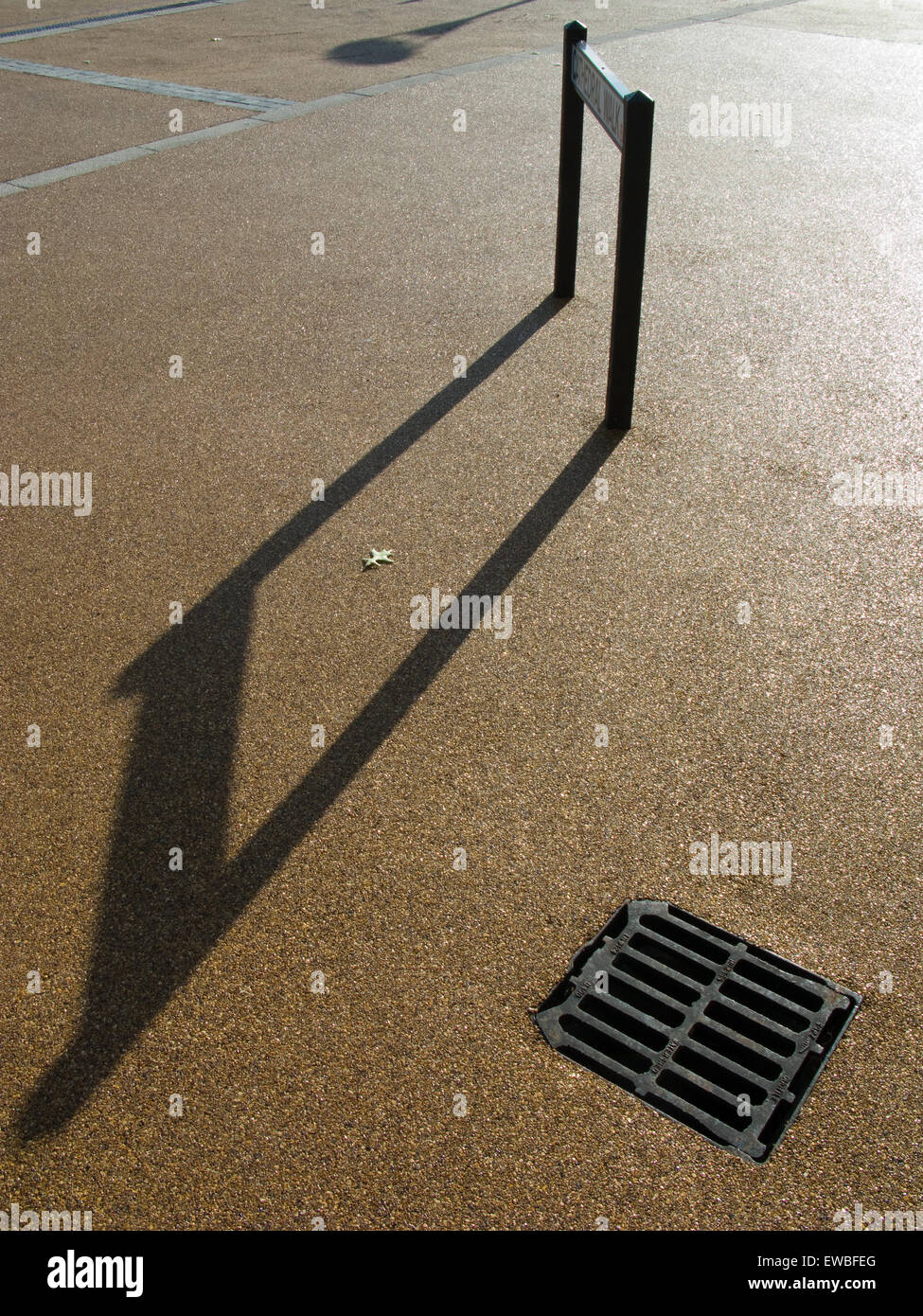 Shadow road sign hi-res stock photography and images - Alamy