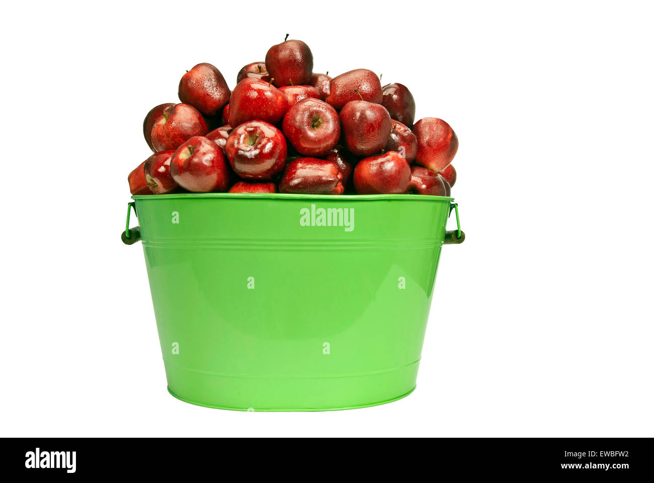 Bucket overflowing with red delicious apples isolated on white Stock ...