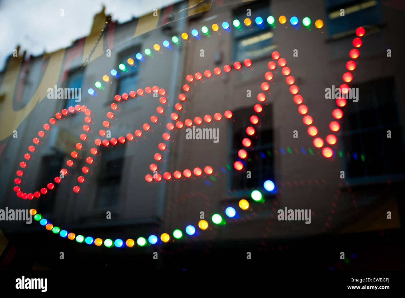 'Open' neon sign in shop window Stock Photo - Alamy