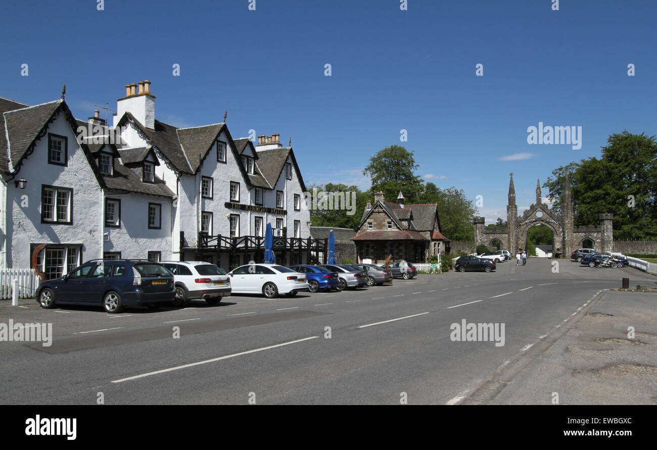 Kenmore street scene with Taymouth Estate Gateway and hotel Scotland ...