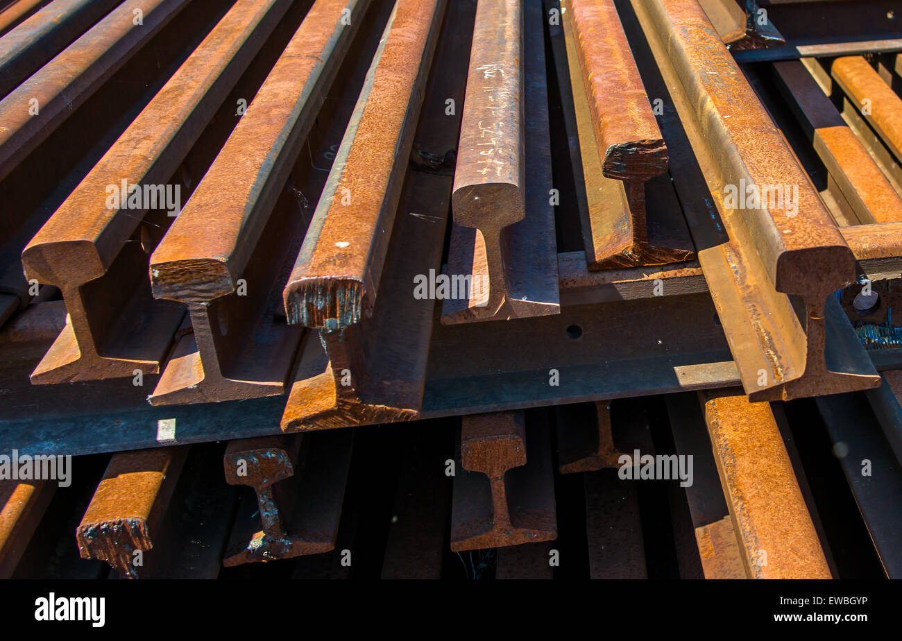 Pile Of Old Rusty Rails Stock Photo - Alamy