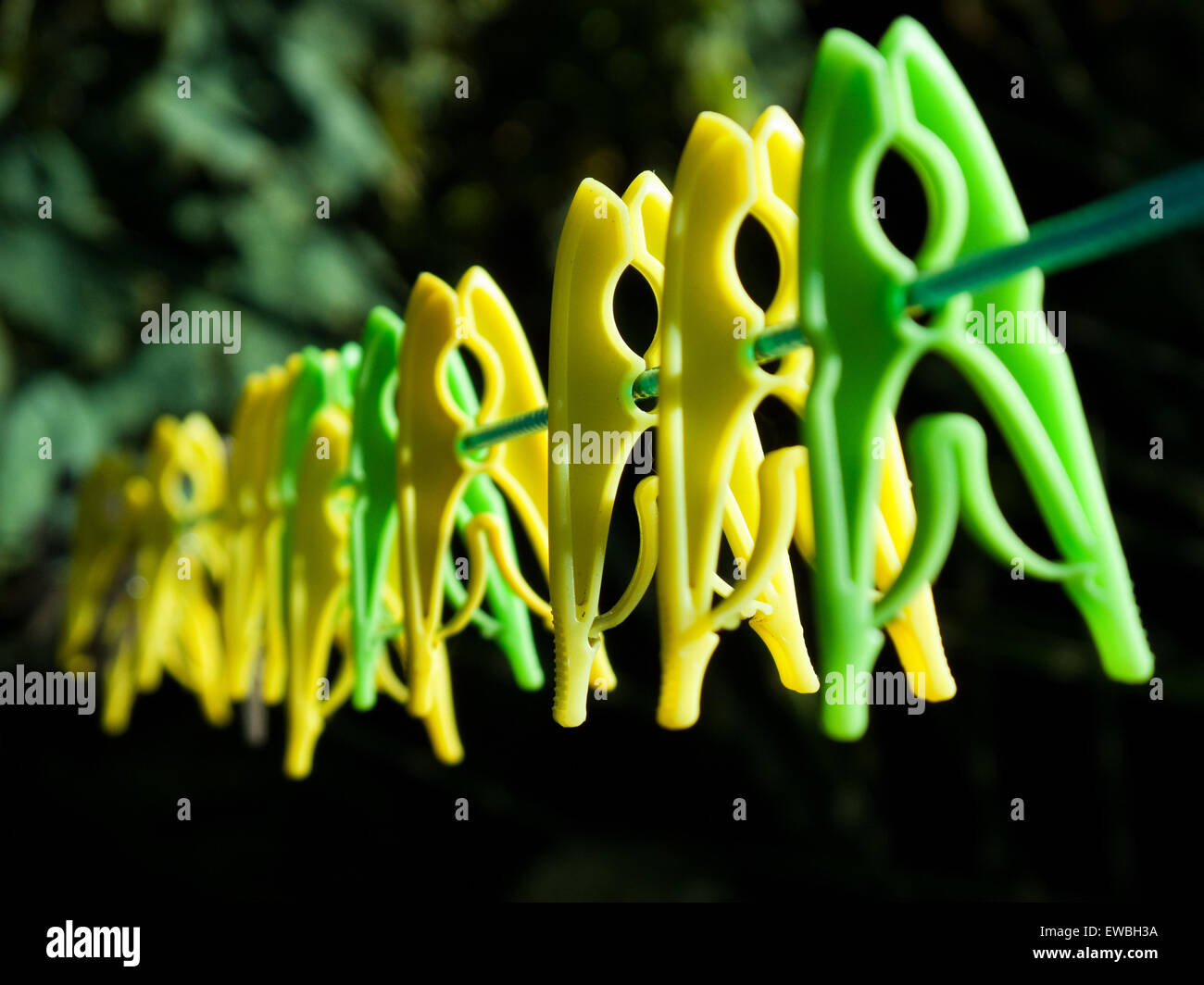 Clothes pegs on washing line Stock Photo - Alamy