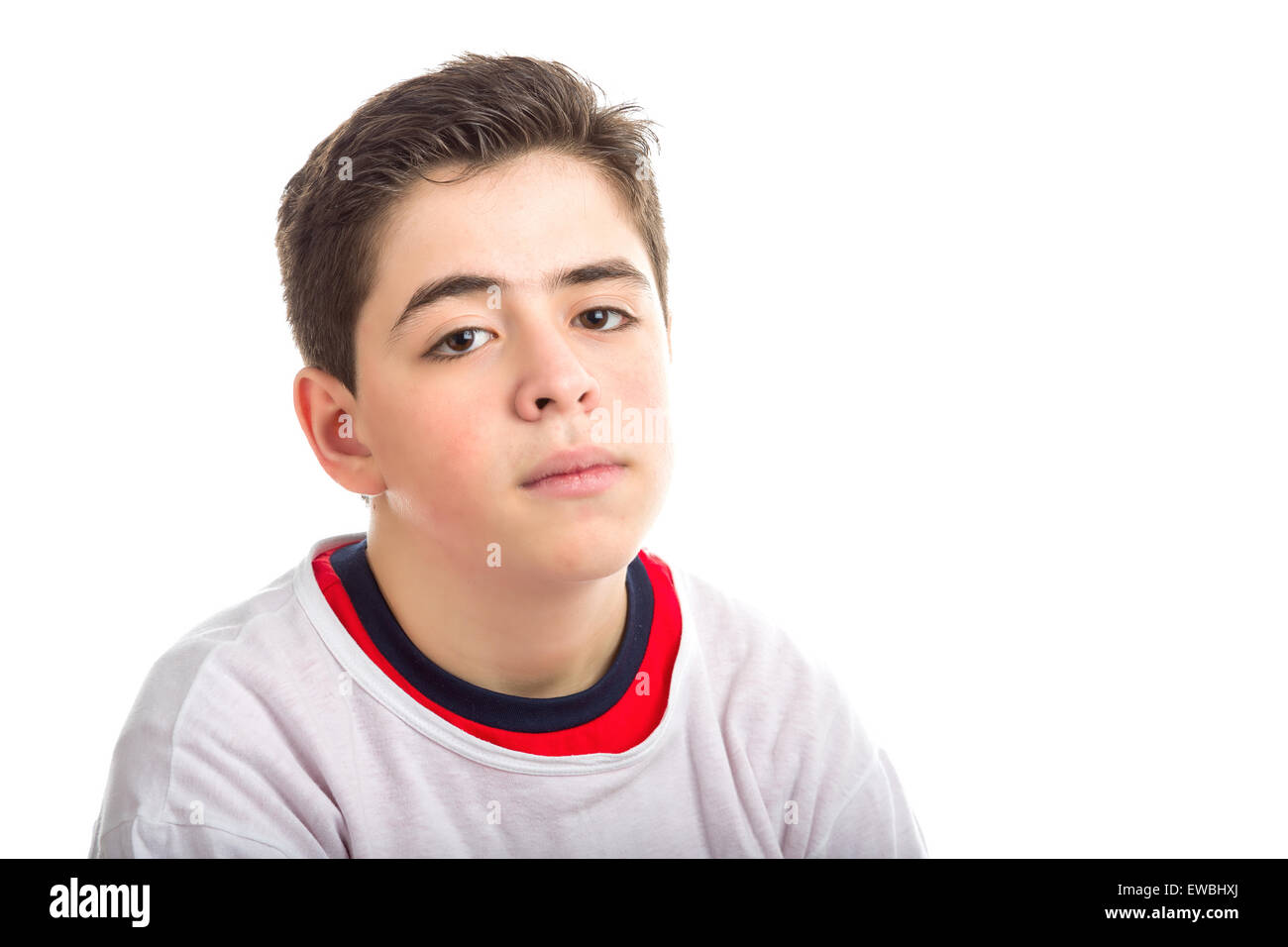 A cute Caucasian smooth-skinned boy looking calm and confident while ...