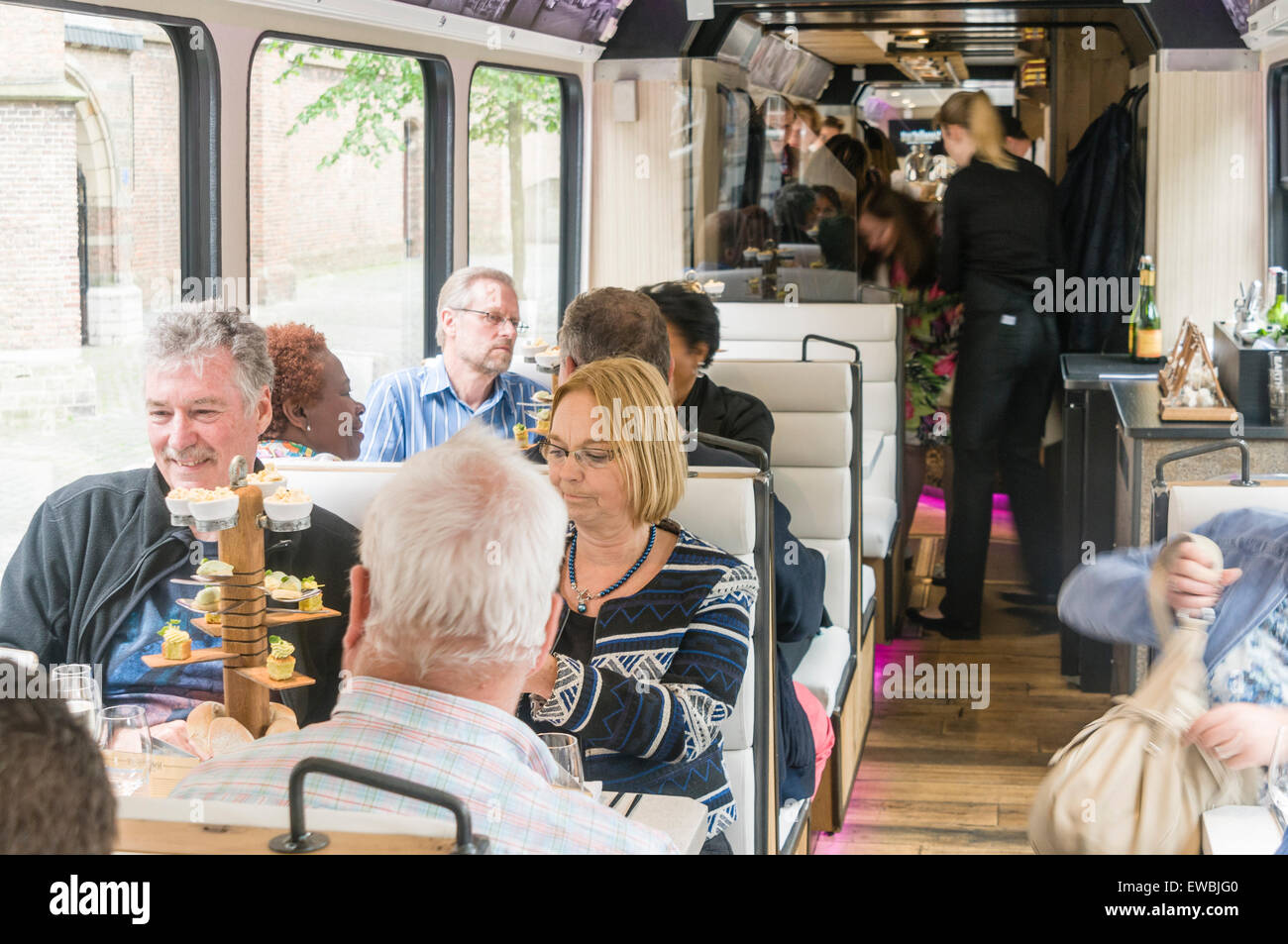 Diners enjoying the service on board the Hoftrammm tram restaurant, Den ...