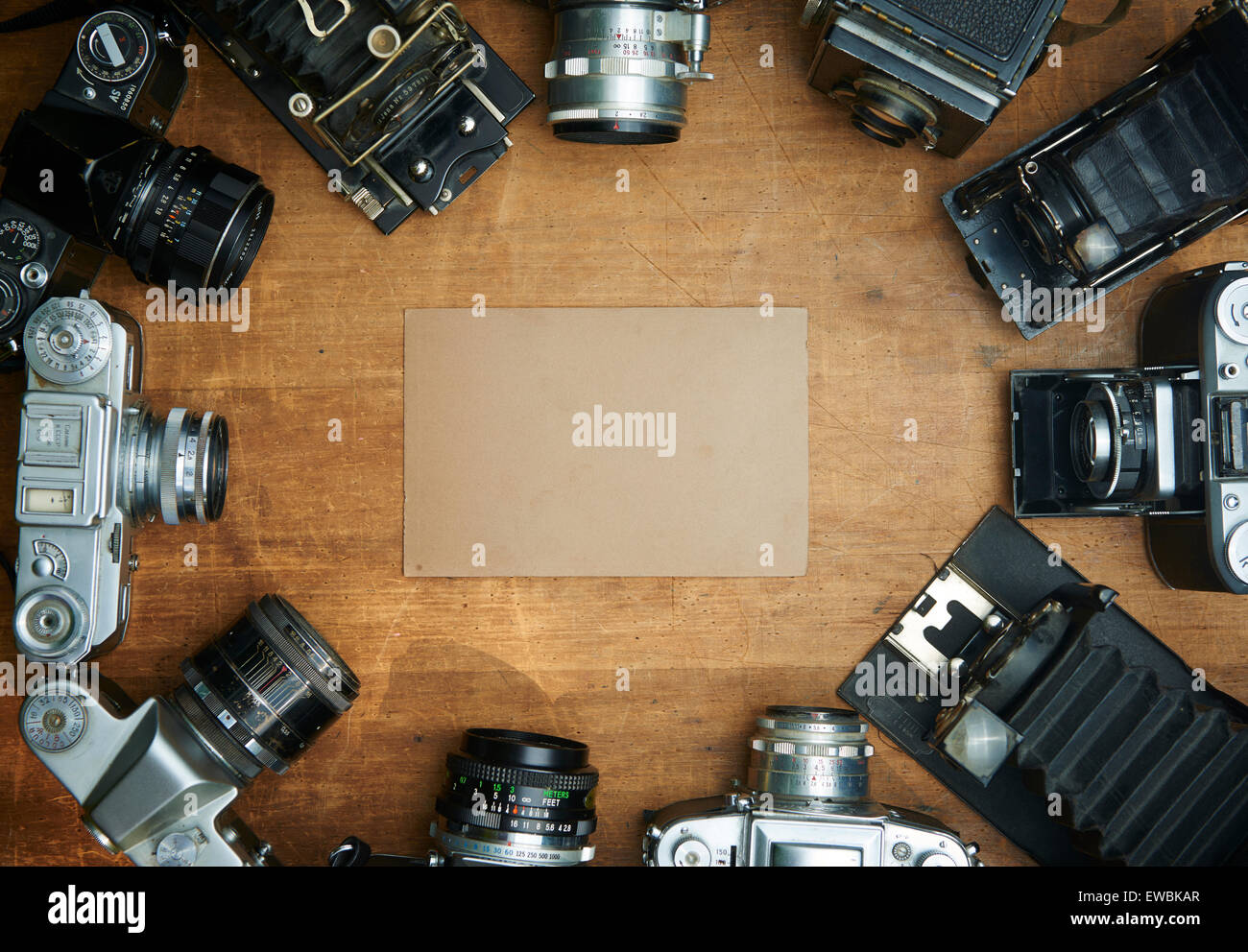 Old retro film analogue cameras collection on vintage wooden desk ...