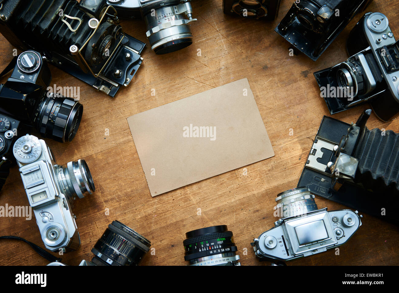 Old retro film analogue cameras collection on vintage wooden desk ...