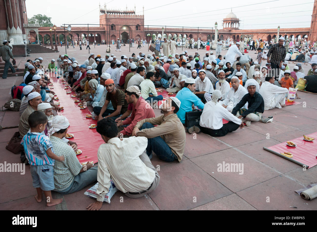 Traditional Iftar (fast-breaking) at Jama Masjid during Ramadan. Old ...