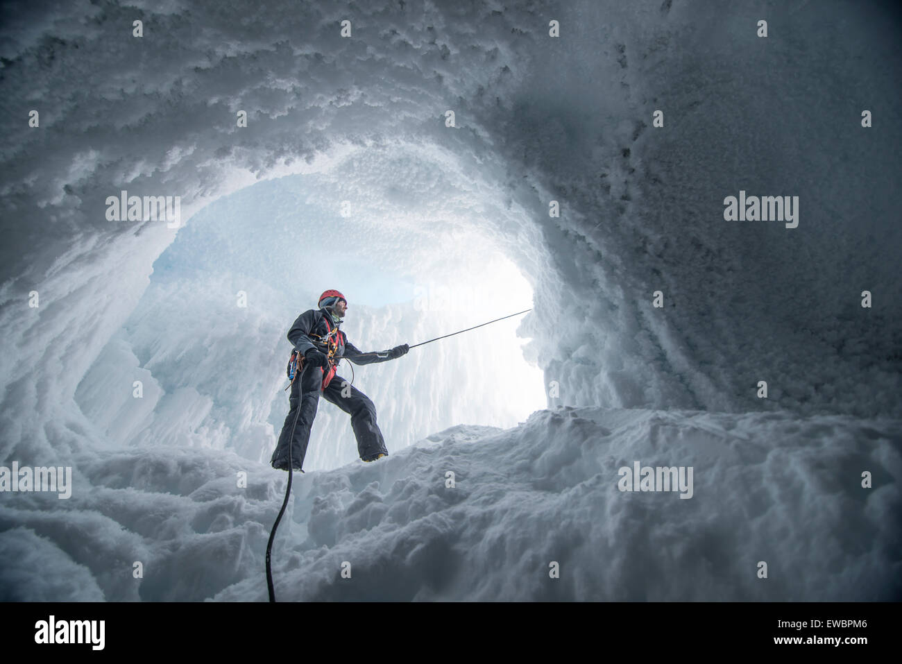 Man standing in Mount Erebus steam cave, Ross Island, Antarctica Stock ...