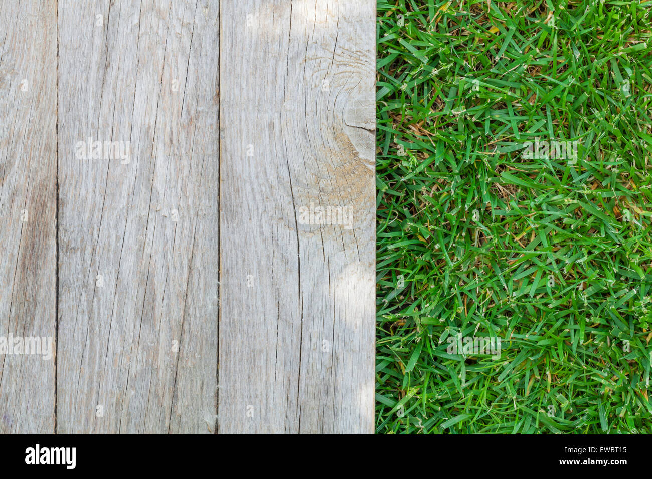 Wooden floor with green grass background. Top view Stock Photo - Alamy