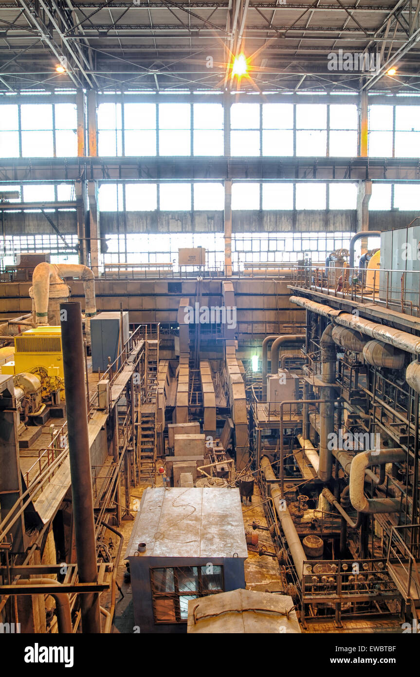 Pipes, tubes, machinery and steam turbine at a power plant Stock Photo ...