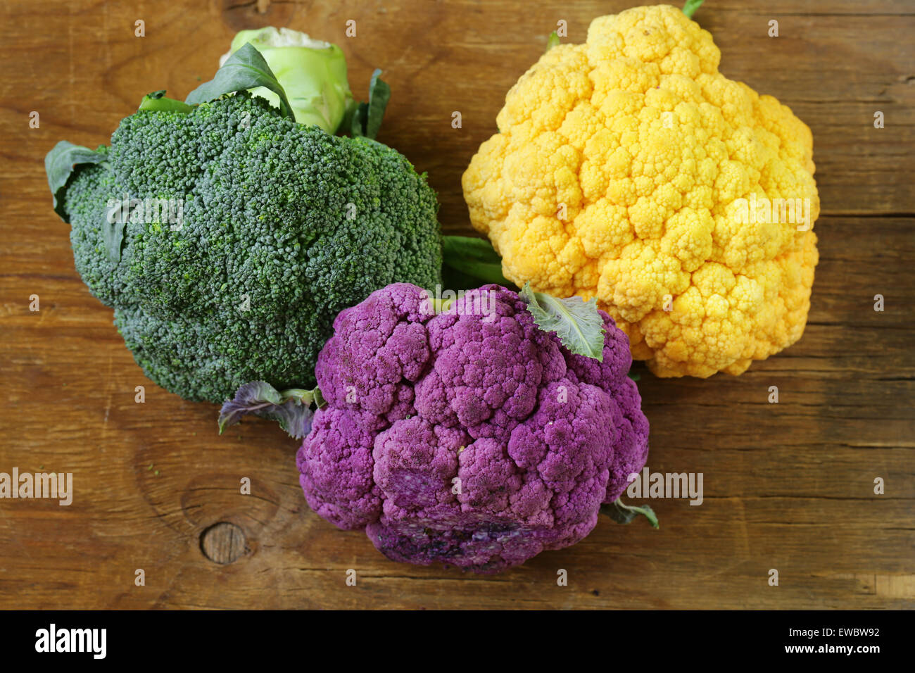 different cauliflower broccoli green yellow and purple Stock Photo - Alamy