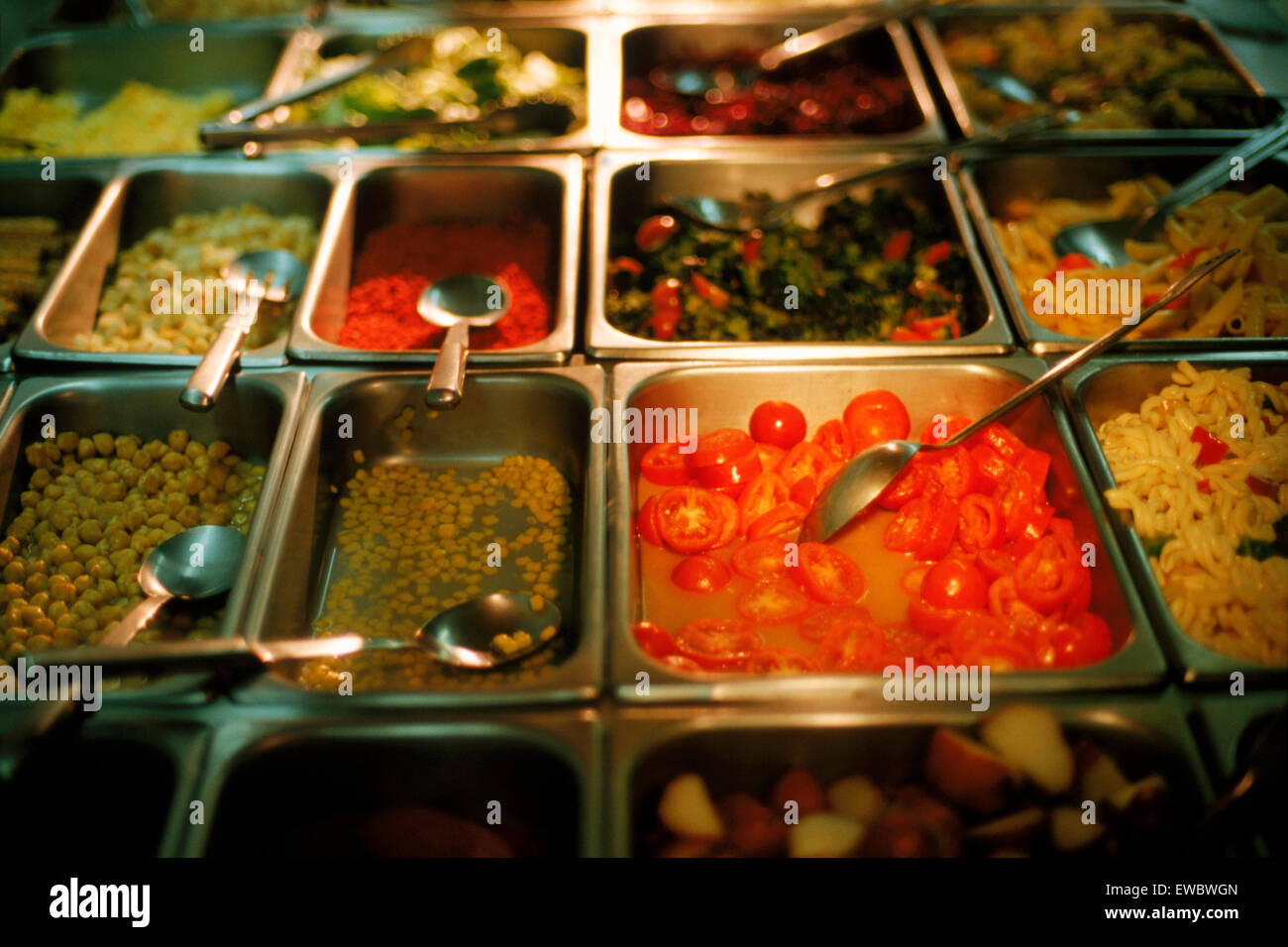 Hot food placed in metal trays ready to be served, New York, USA Stock ...