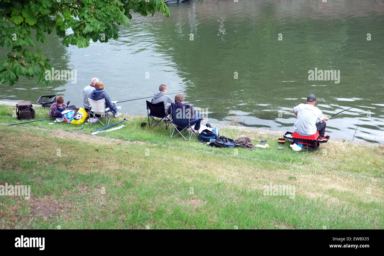 People fishing on the riverside Stock Photo - Alamy