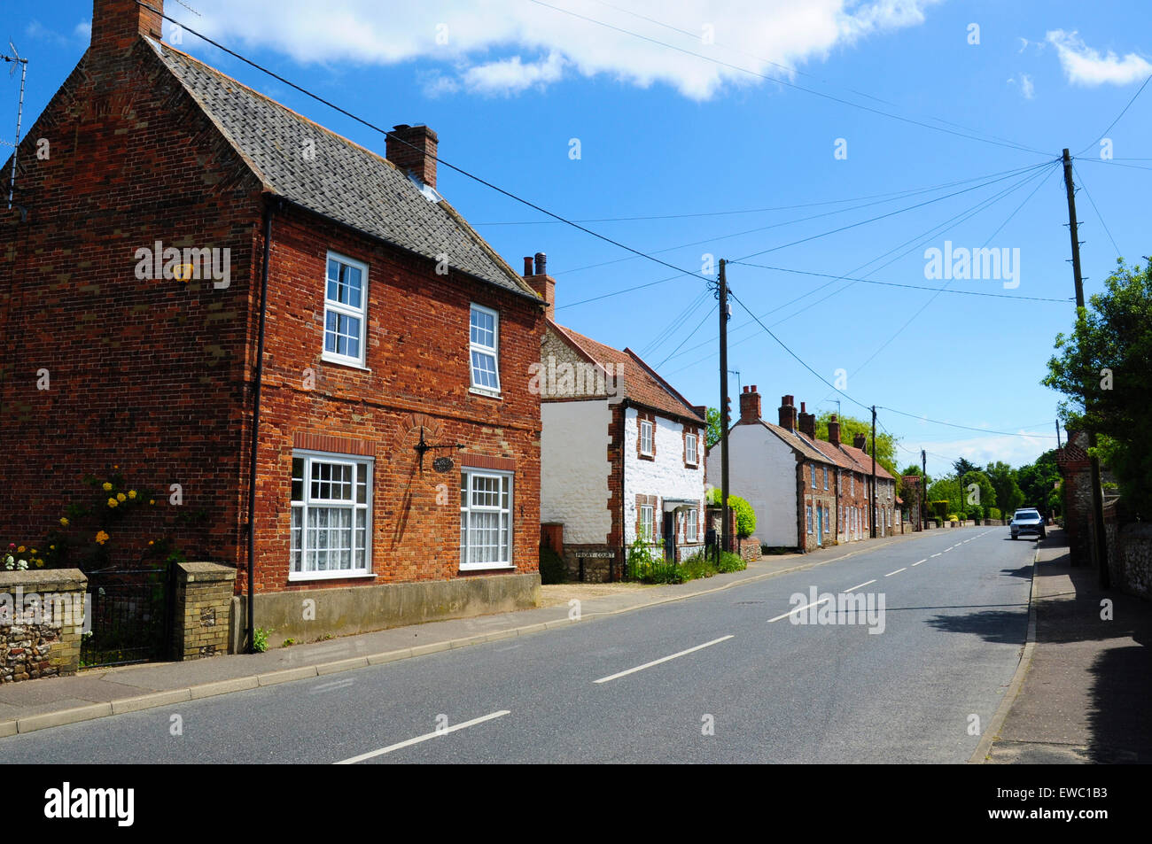 Quiet village road and cottages, Thornham, Norfolk, England, UK Stock ...