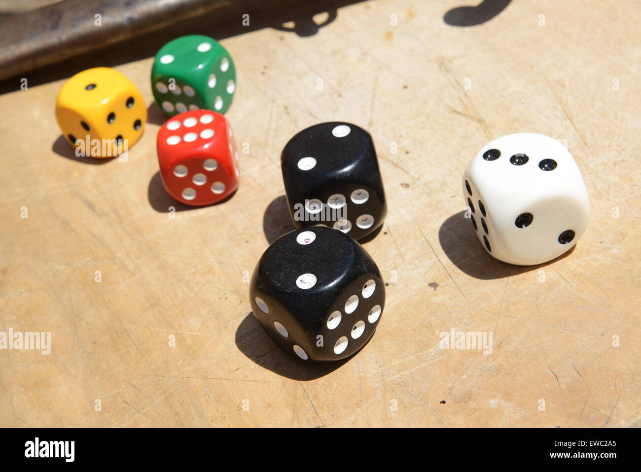 Coloured dice hi-res stock photography and images - Alamy