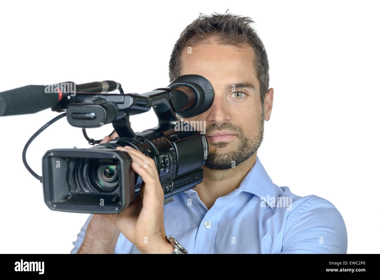 a young man with professional movie camera on white background Stock ...