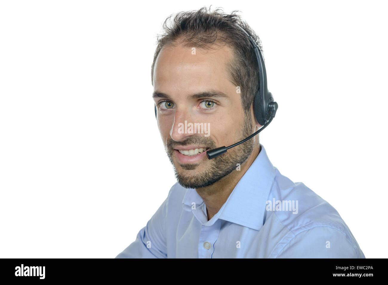 Handsome customer service operator wearing a headset on white ...