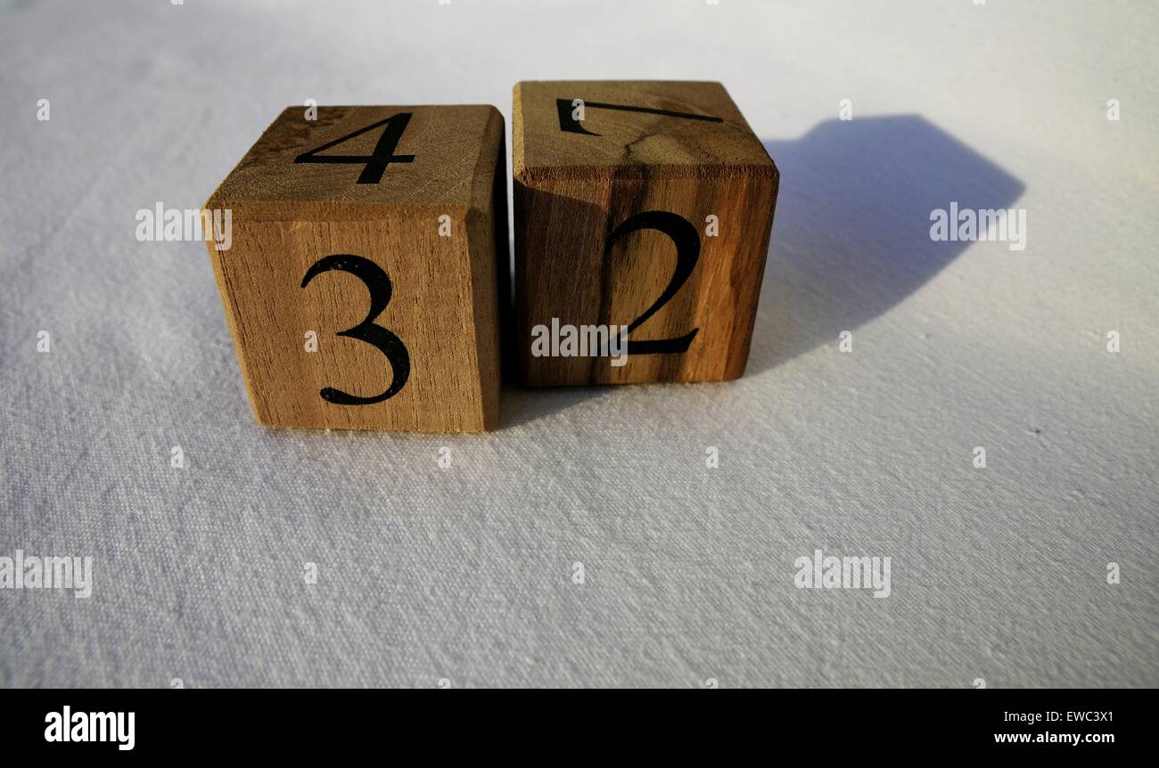 Numbers on wooden cubes Stock Photo - Alamy