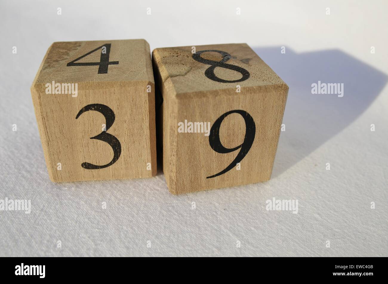 Numbers on wooden cubes Stock Photo - Alamy