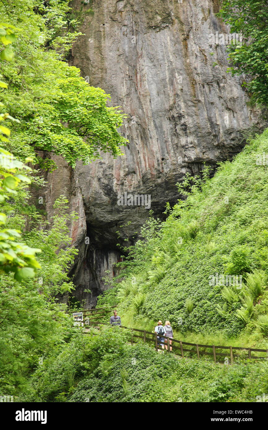 People approach the vast entrance of Peak Cavern, a show cave in ...